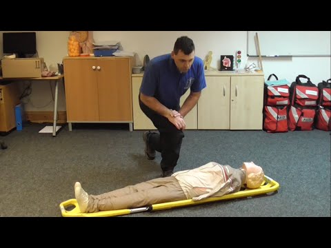 Loading a patient onto a scoop stretcher