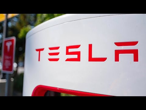 Tesla shares rebound from record plunge