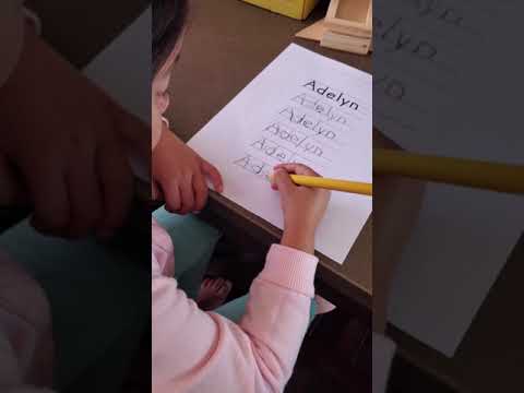 Adelyn writing her name