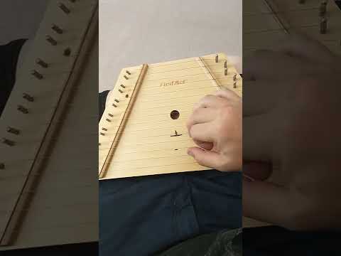my furry deer friend gave me a lap harp - first act lap harp demonstration