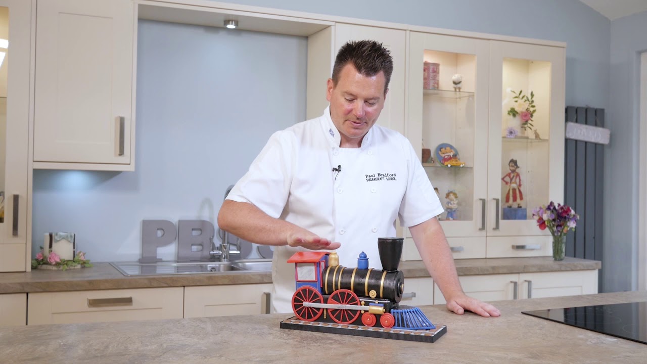 Learn how to make a fully edible steam train out of cake