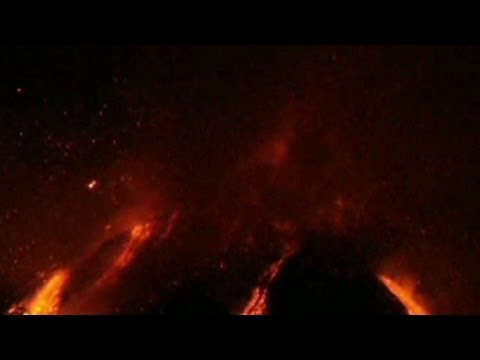 See Mt. Etna's nighttime eruption