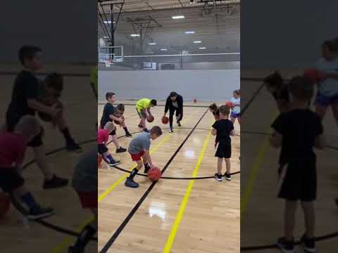 Teaching Beginners How To Dribble Between Legs
