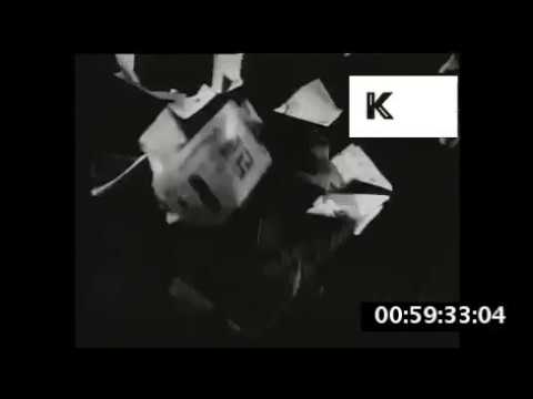 1940s, 1950s Newspapers Flying Up and Down, Black Background