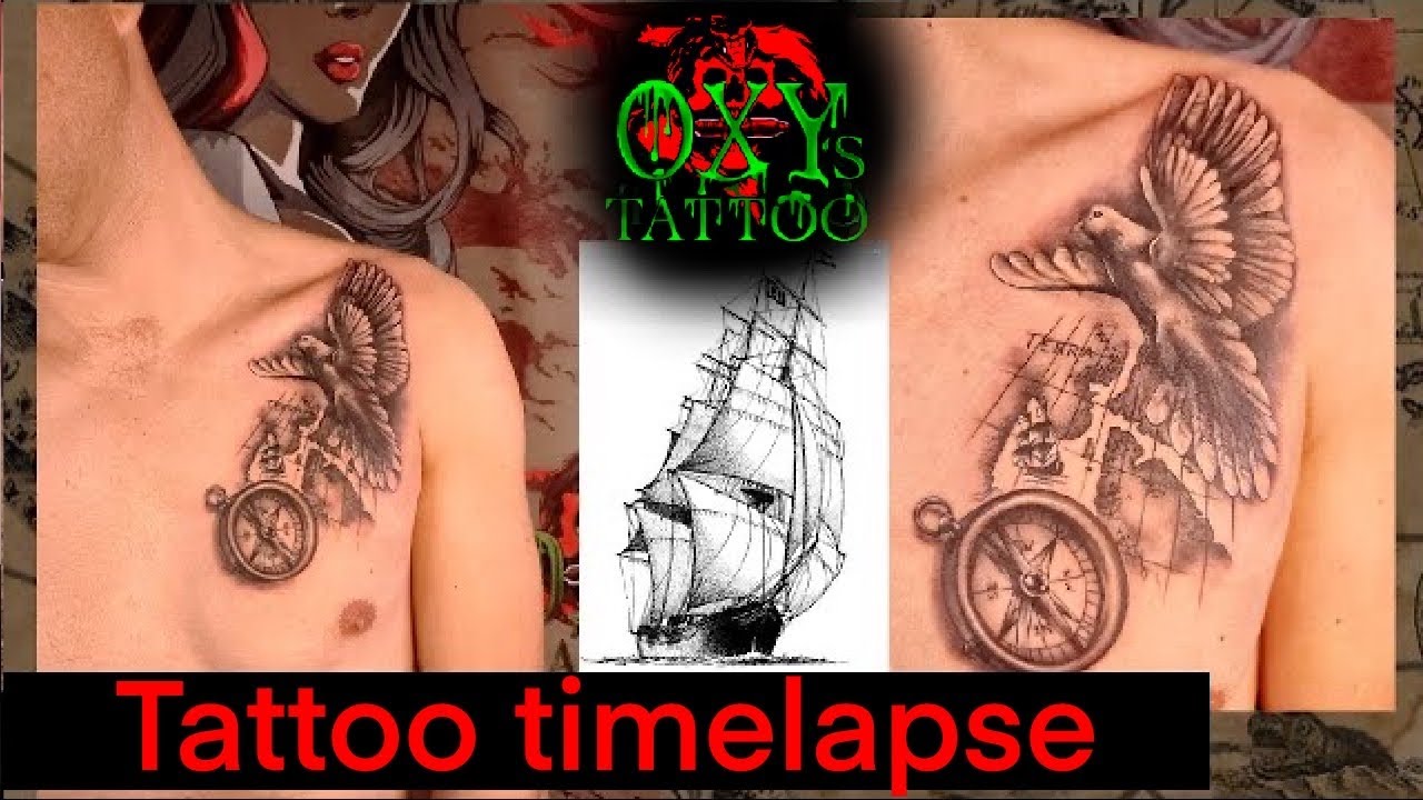 Compass chest tattoo in Black and Gray style.