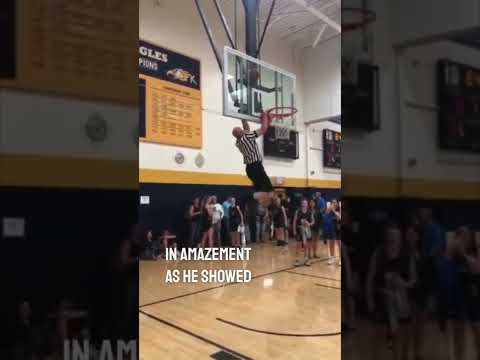 This ref climbed up the basketball hoop 😳😂
