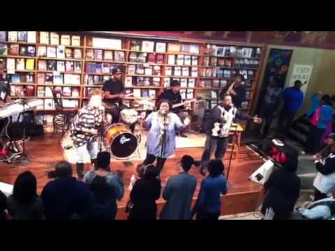 He loves us "Singing with family" at the Good News Cafe'