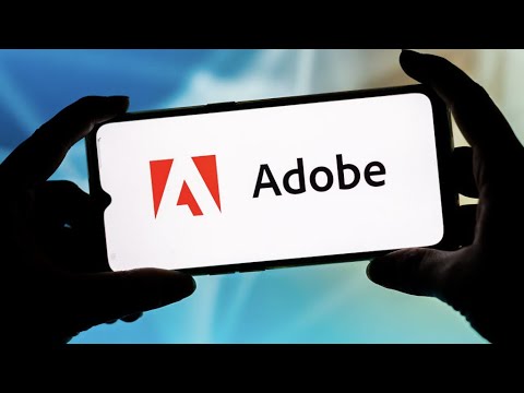 Adobe down, Fedex up, AT&T pops on analyst rating