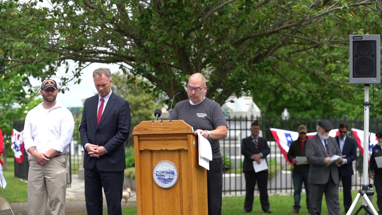 New Bedford's Joseph Ford Sr reads of a poem for fallen soldiers