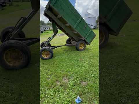 John Deere dump wagon, will go 50 to 55 MPH down the road, works great ...