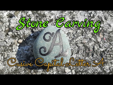 Stone carving: cursive capital letter A