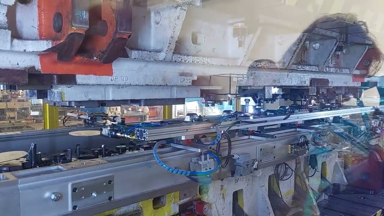 TRANSFER PRESS TOOLING WITH PARALLEL GRIPPERS