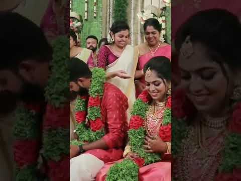 weding couple groom kiss bride her cheek in rasam
