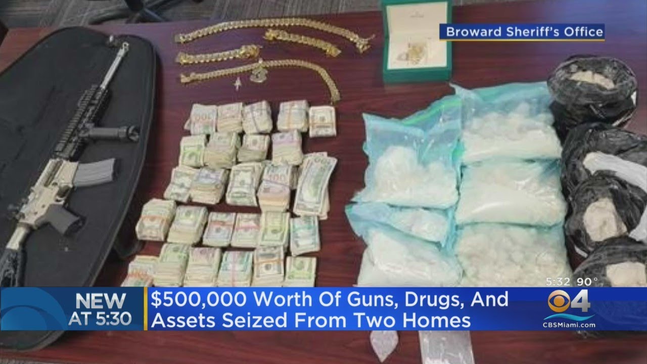 $500,000 Worth Of Guns, Drugs & Assets Seized From To Homes