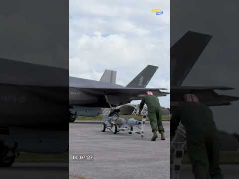 US Marines Load Weapons onto an F-35B Lightning II at Kadena Air Base