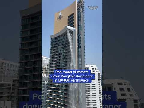 Pool water plummets down Bangkok skyscraper in MAJOR earthquake