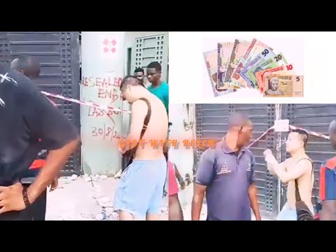 Chinese man in Lagos state tears Nigeria currency in the present of Lagos state officials.