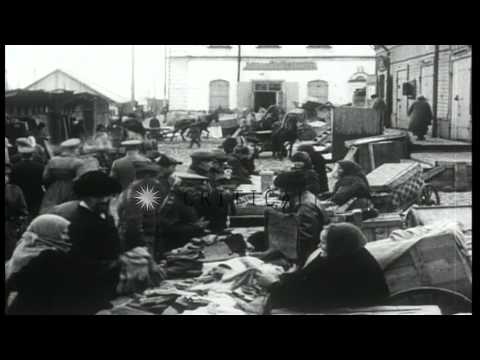 US Army soldiers interact with villagers at a market in Arkhangelsk Russia, duri...HD Stock Footage