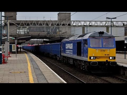 Stafford Railway Station 60028 DCRail passes P5 on 6M89 on the 28th January 2023