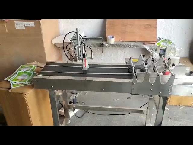 Automatic Conveyor Feeder Machine - High speed pouch feeder with coder ...