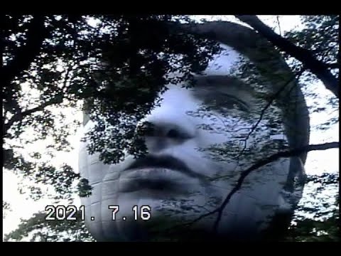 Giant Floating Head In Tokyo Looks Like The Colossal Titan From AOT