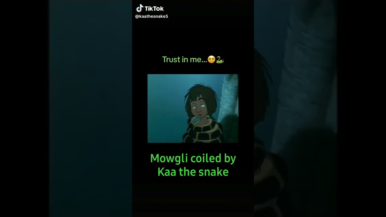 Mowgli getting coiled while Kaa the snake is hypnotizing him (from The Jungle Book)