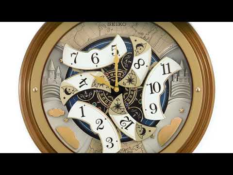 QXM381B Seiko Melodies In Motion Brown Musical Wall Clock