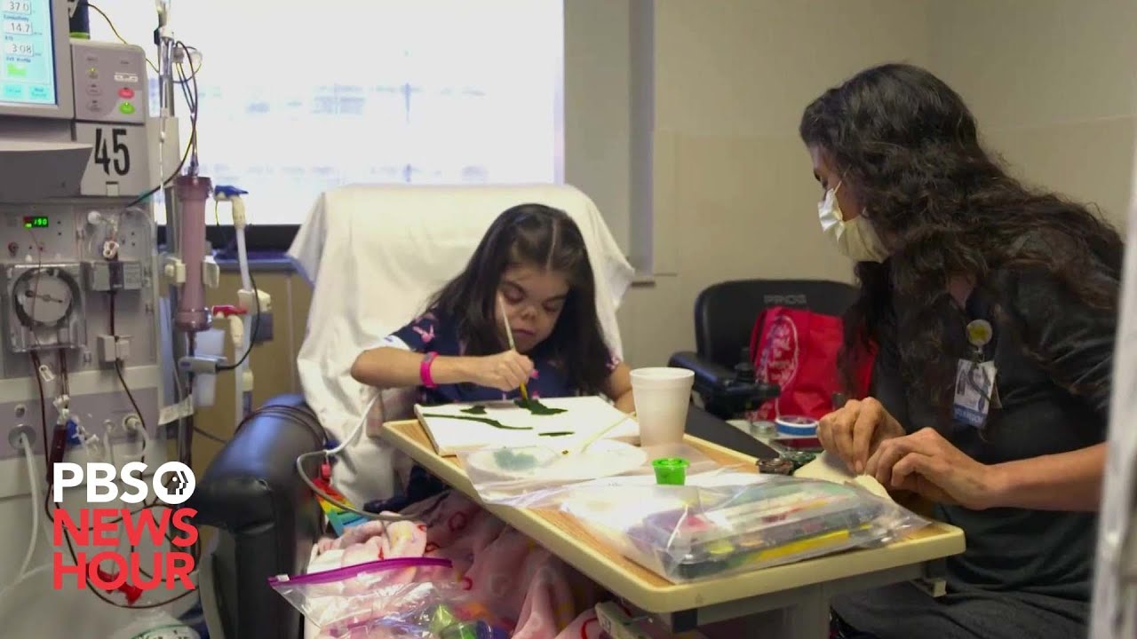 Artists work next to doctors to help with healing in hospitals