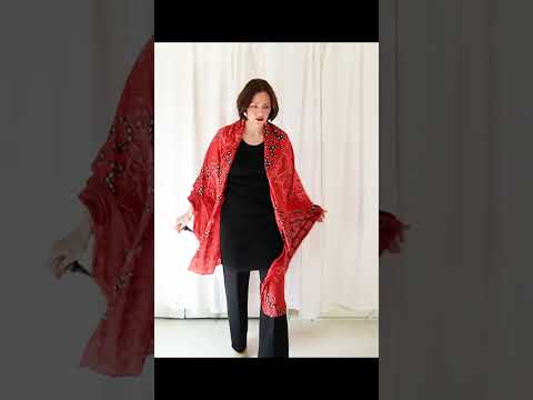 Add a giant silk scarf to your evening look