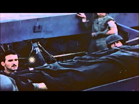 US Navy Corpsmen bring wounded soldiers aboard a LCVP (Landing Craft Vehicle Pers...HD Stock Footage