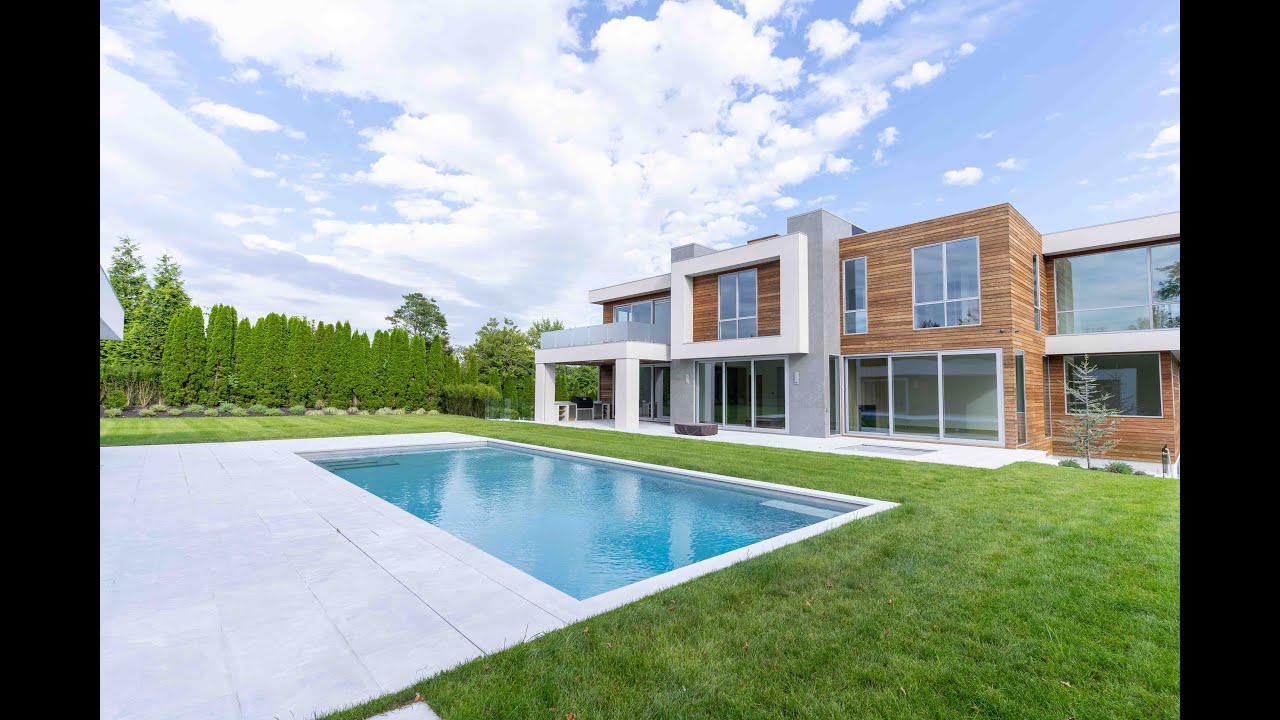 Minimalist Pool Design with Afyon Ice Marble Pavers, Copings, and Steps in Sag Harbor, NY