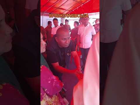 kunjungan Bapak RAHMANSYAH SIBARANI ,SH,MH.DPRD prov sumut kelokasi kebakaran di jalan hiu sibolga