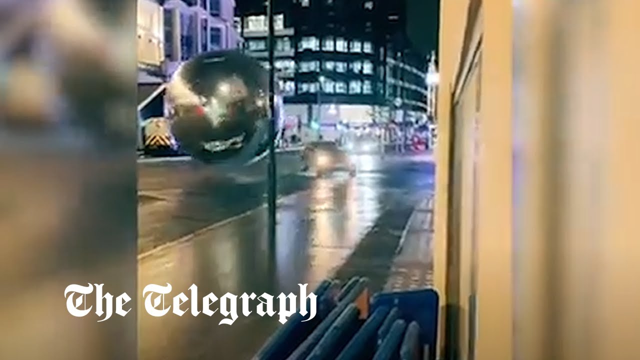 Watch: Giant runaway balls cause chaos on London street