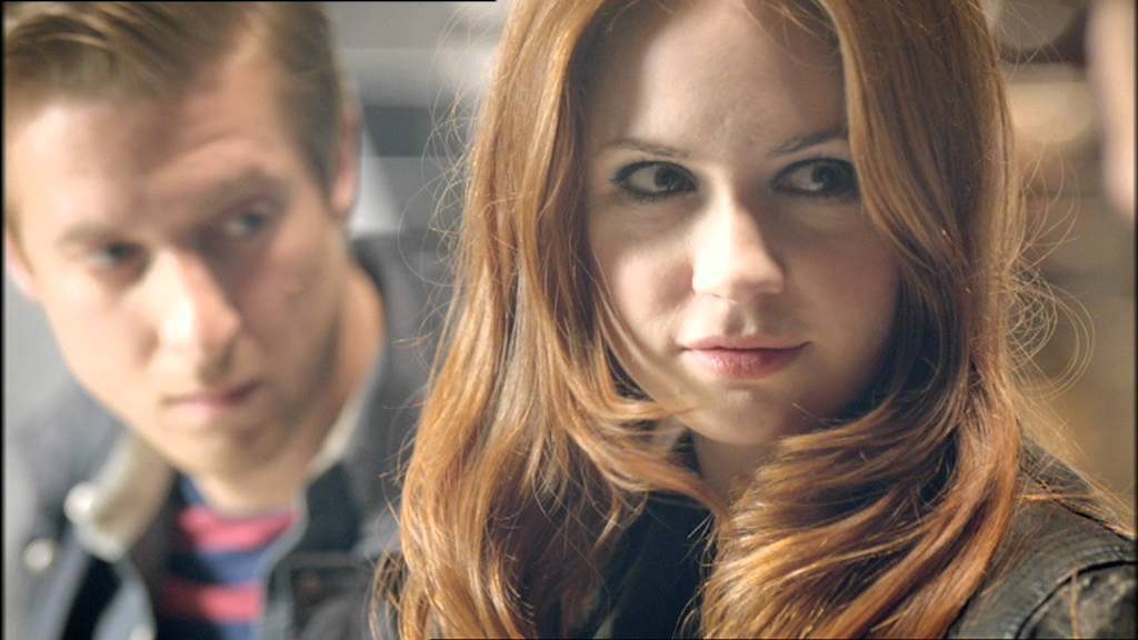 Doctor Who series seven photos: Time Lord carries Amy Pond in his arms ...