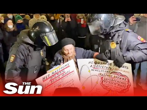 Grandmother bundled away by Russian police at Ukraine anti-war protest