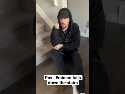 Eminem falls down the stairs