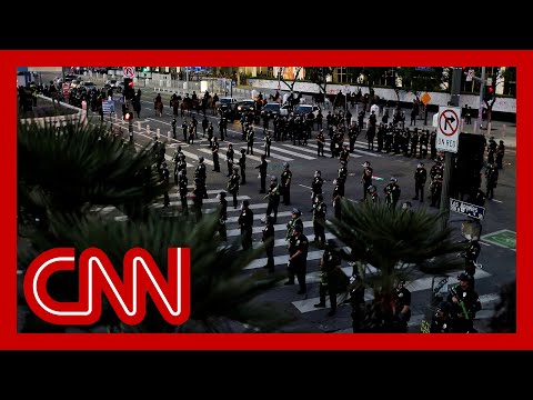 Over 200 arrested, 2 officers injured, businesses looted as LA braces for new night of protests