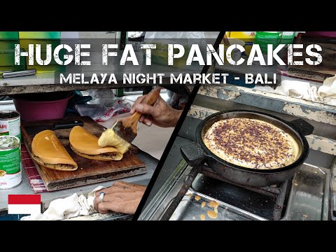 Street food - Huge fat pancakes at the Melaya night market at Bali in Indonesia