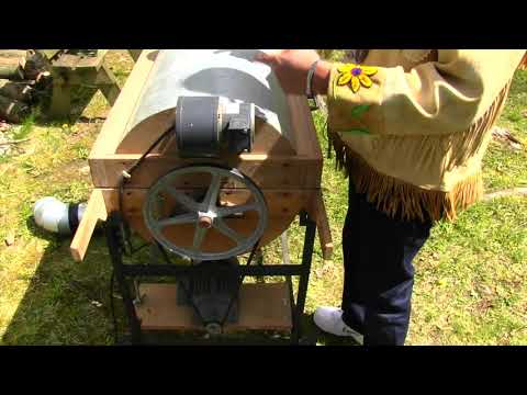 Roger Cook explains rice thrasher