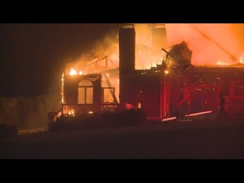 Wind complicating fire at ocean-front home in Narragansett