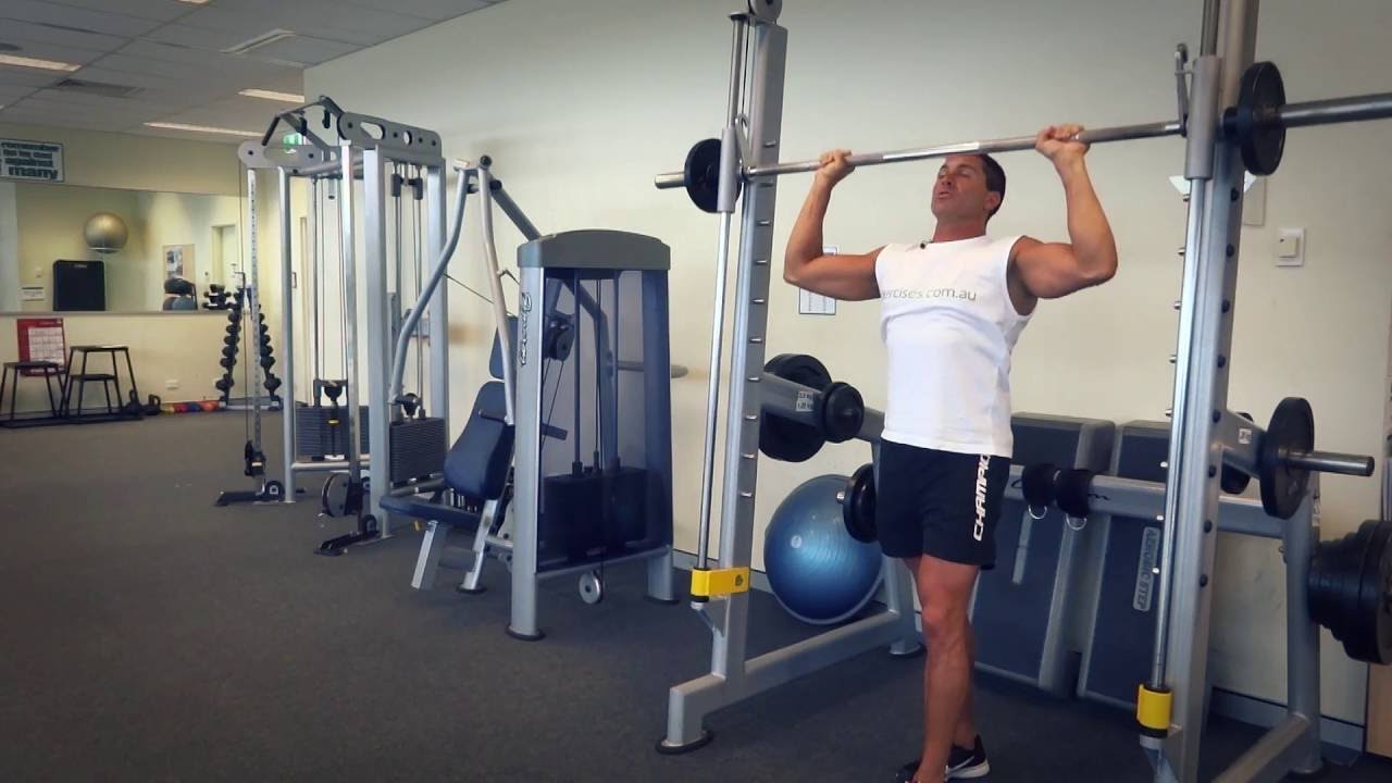 Smith Machine Military Press (Exercises.com.au)