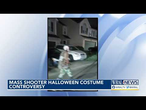 Person carries 'Mass Shooter Lives Matter' sign into Hedingham neighborhood
