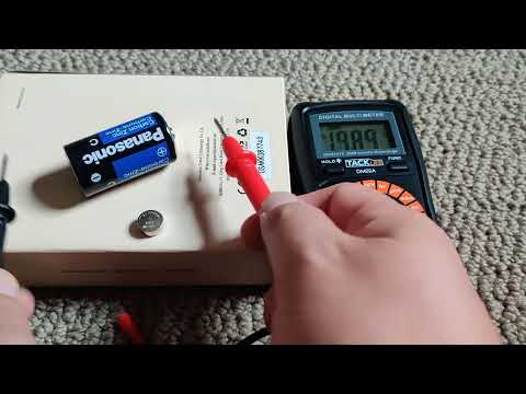 check battery voltages on some old/small lr44 batteries.  Using Tacklife DM02A voltage multimeter