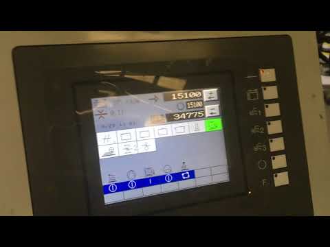 Komori G540 feeder running a job at 15k sheets per hour