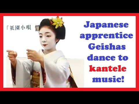 Japanese apprentice Geishas (Maiko) dance to kantele music in Kyoto