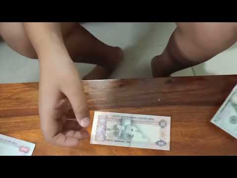 Take a look on US dollar and Dubai's Dhiram currency