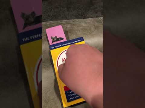 ASMR tapping on Merriam Webster thesaurus book