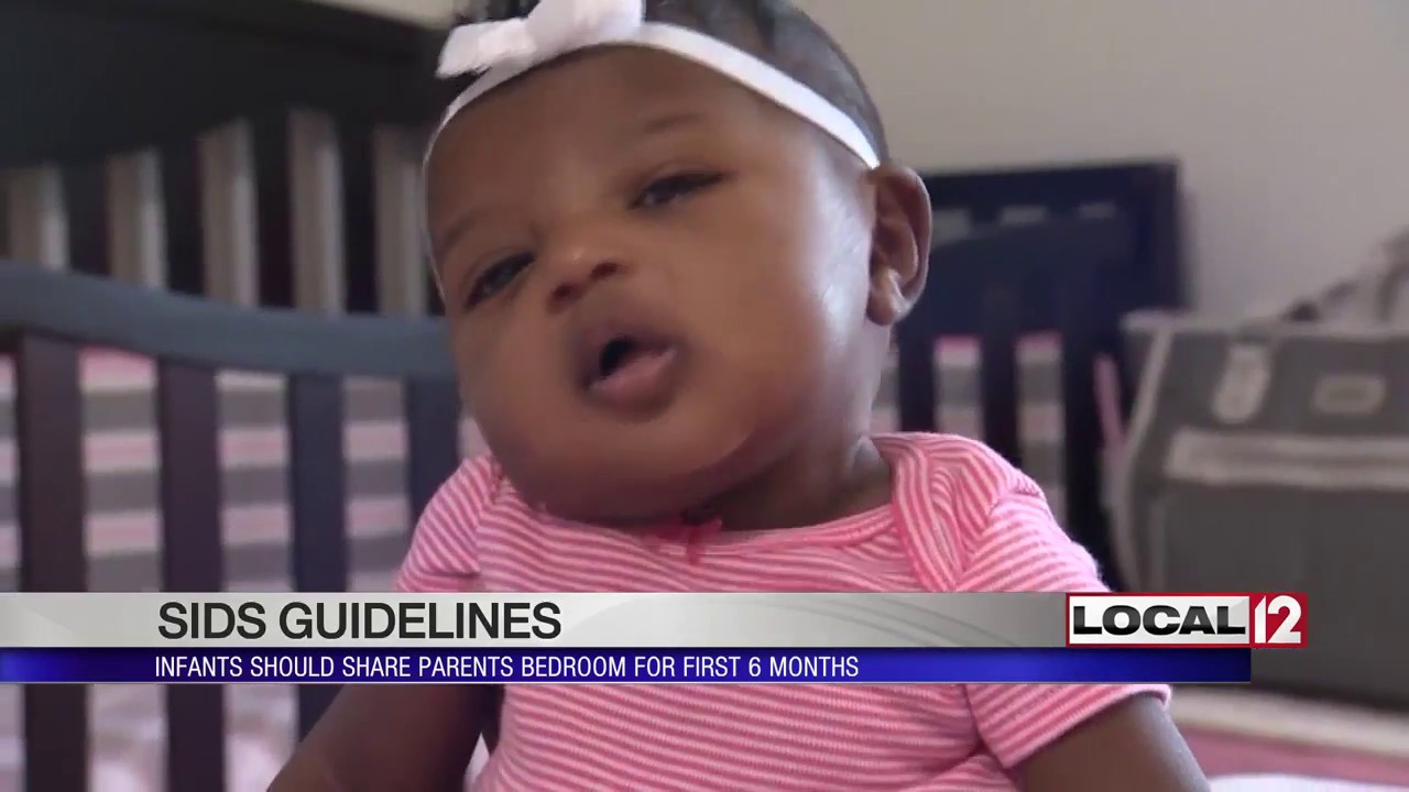 Pediatricians group recommends infants sleep in parents' room for first year
