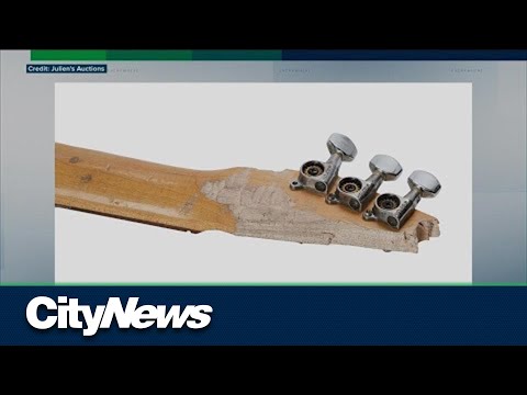Smashed Kurt Cobain guitar sells for $800K at auction