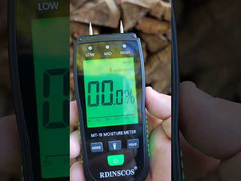 checking the moisture content of firewood #firewood #moisture